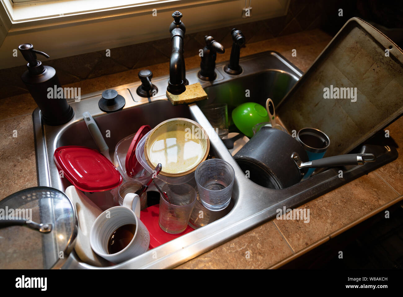 Stack of dirty dishes hi-res stock photography and images - Alamy