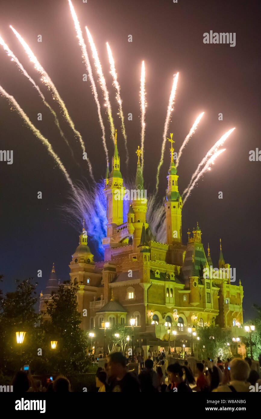 Fireworks explode over the Disney Castle in the Shanghai Disneyland ...