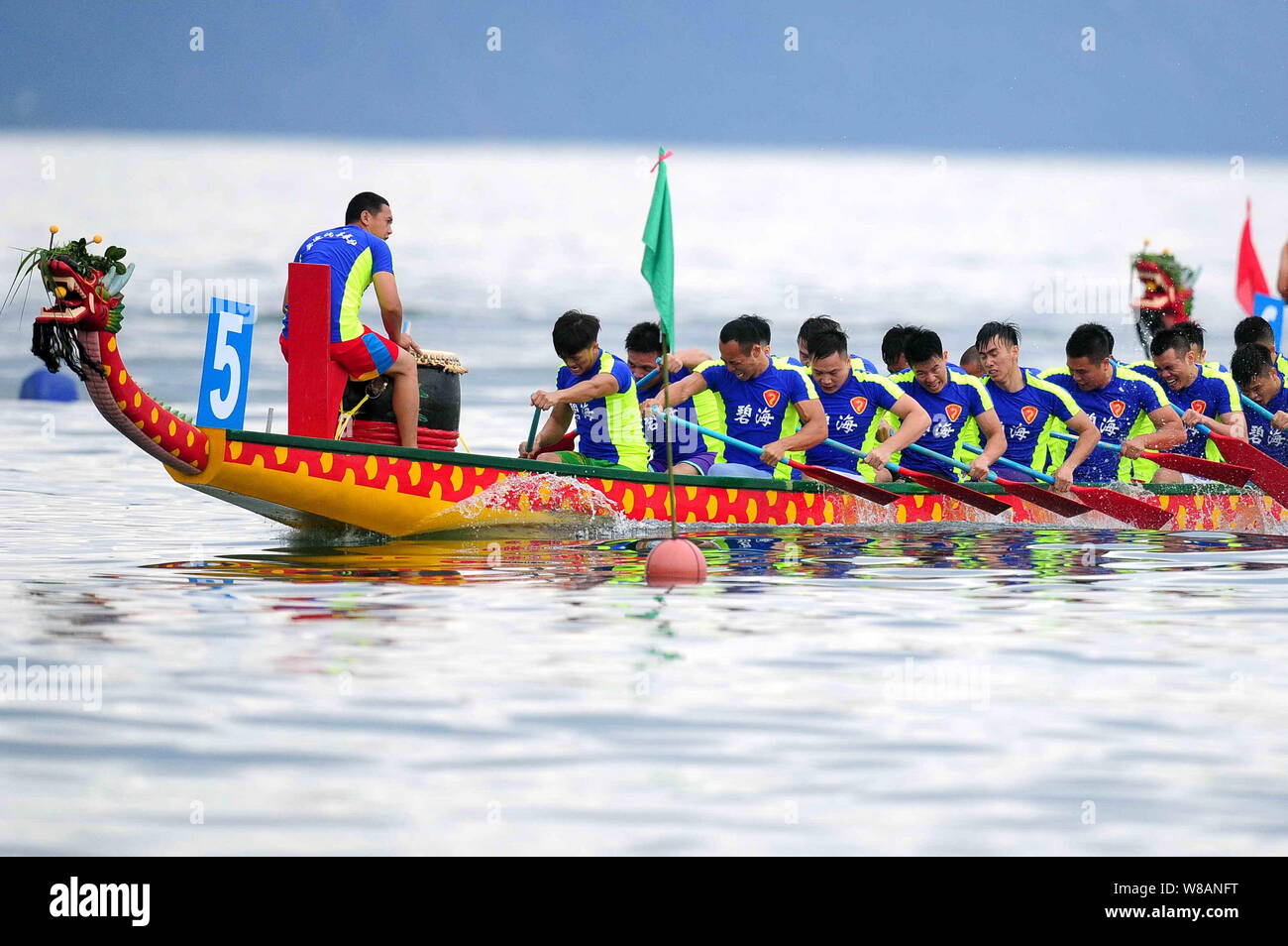 Participants compete in a dragon boat race held to celebrate the Dragon ...