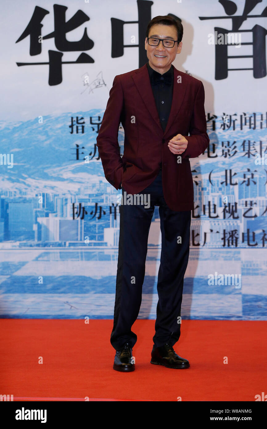 Hong Kong actor Tony Leung Ka-fai arrives on the red carpet for a premiere event of his new ...