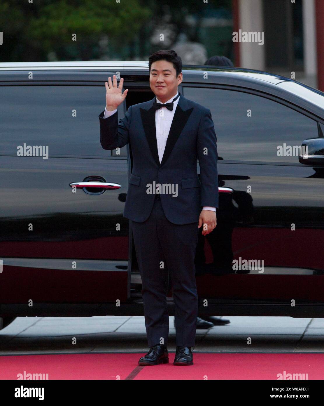 South Korean actor Ahn Jae-hong arrives on the red carpet for the 52nd ...