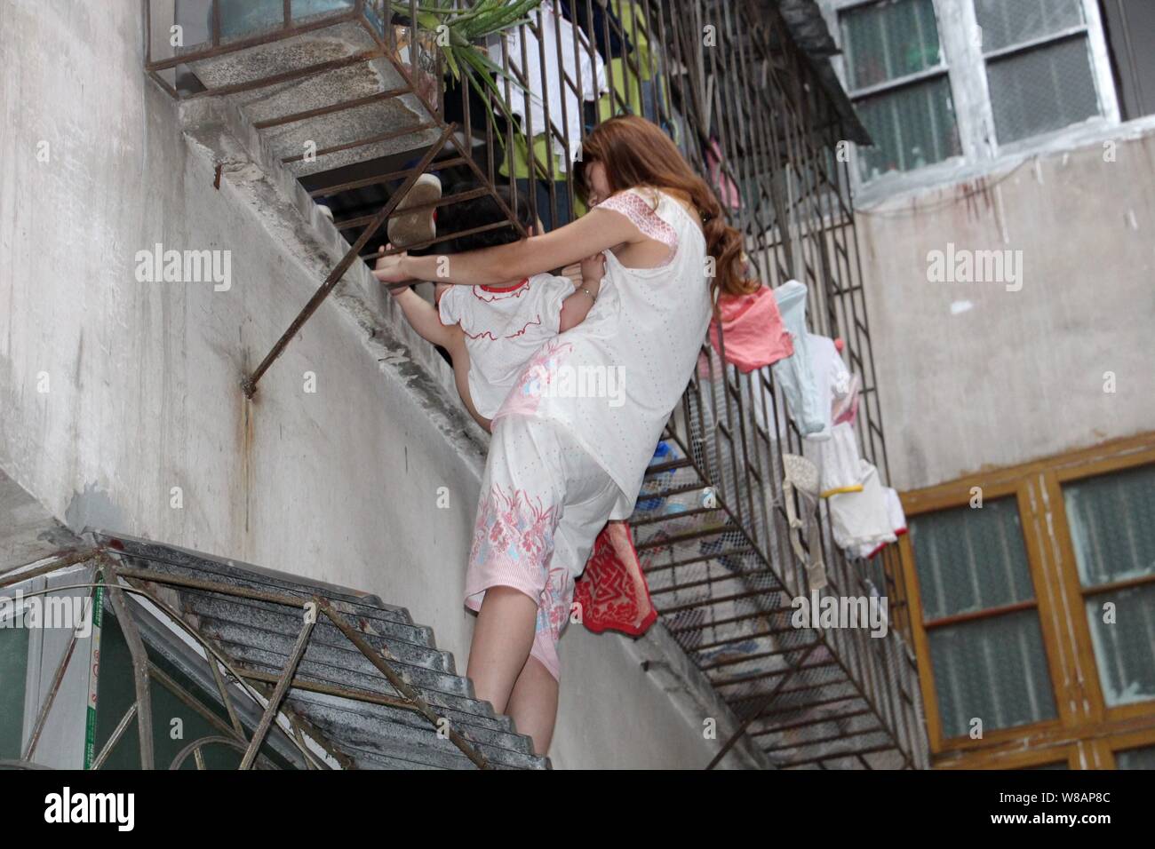 Girl Falling Off Building