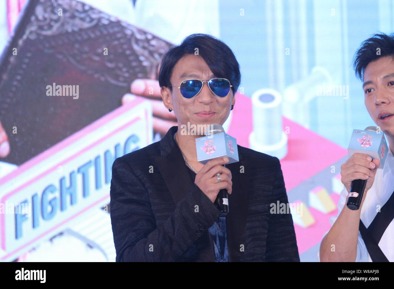 Chen Yufan, left, and Hu Haiquan of Chinese band Yuquan attend the launch event for the ...