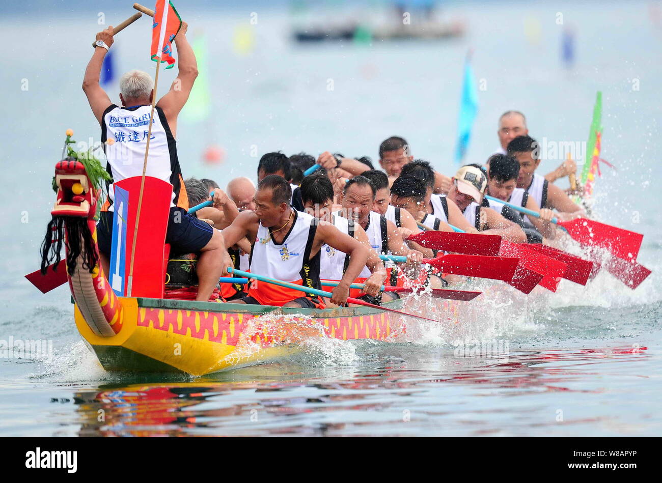 Participants compete in a dragon boat race held to celebrate the Dragon ...