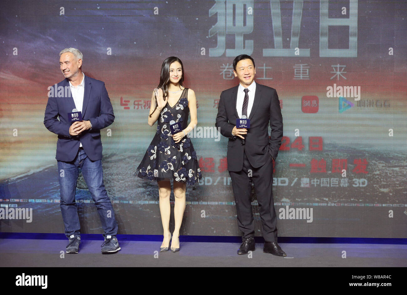(From left) German film director Roland Emmerich, Hong Kong model and ...