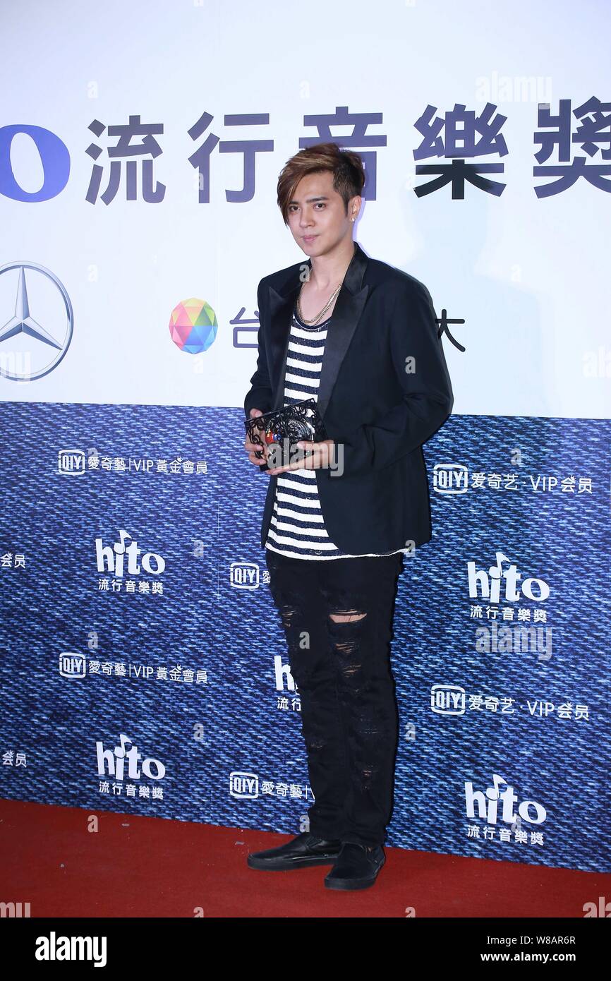 Taiwanese singer Show Lo poses with his trophy at the presentation ...