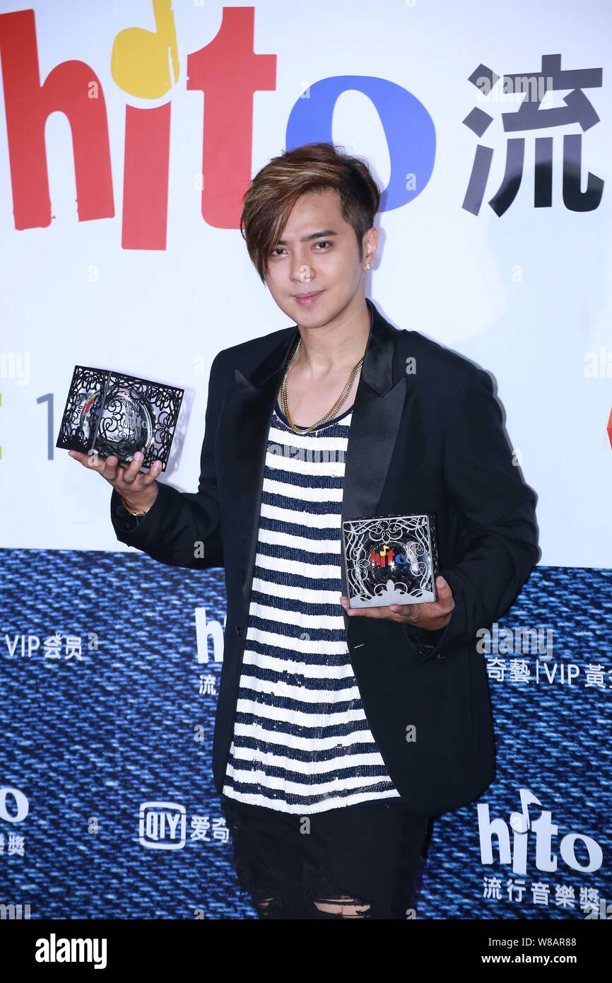 Taiwanese singer Show Lo poses with his trophies at the presentation ...