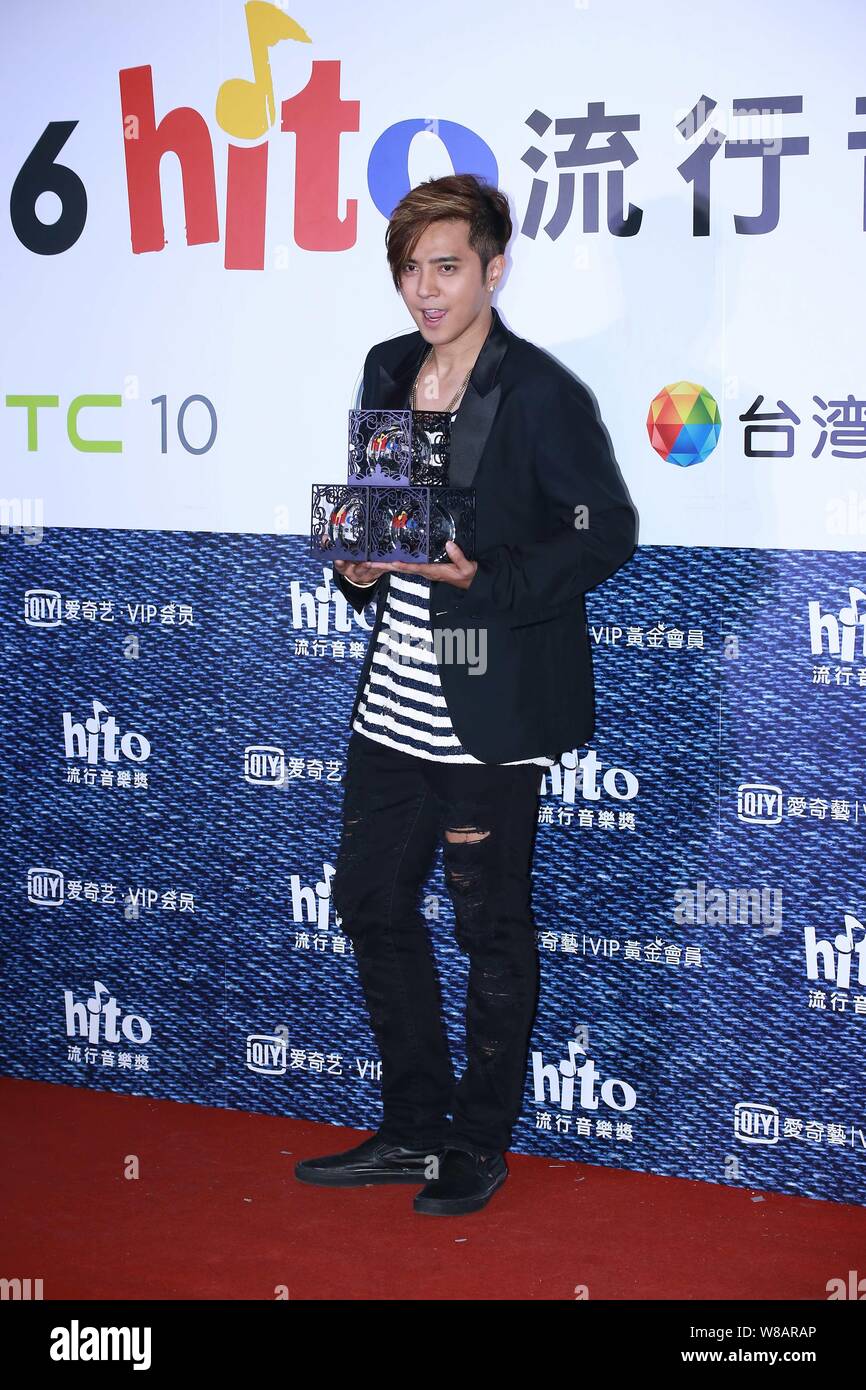 Taiwanese singer Show Lo poses with his trophies at the presentation ...