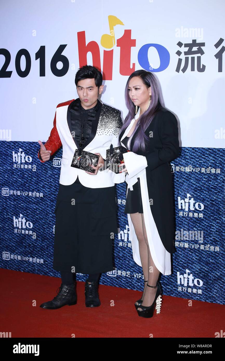 Taiwanese singers A-Mei or Chang Hui-mei, right, and Jay Chou pose with ...