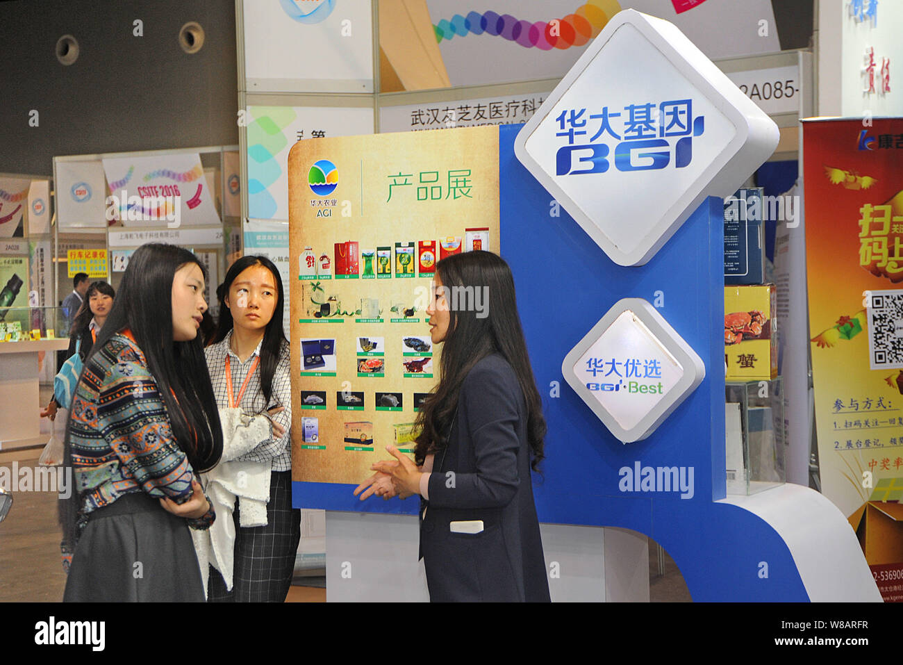 --FILE--People visit the stand of BGI during an exhibition in Shanghai ...