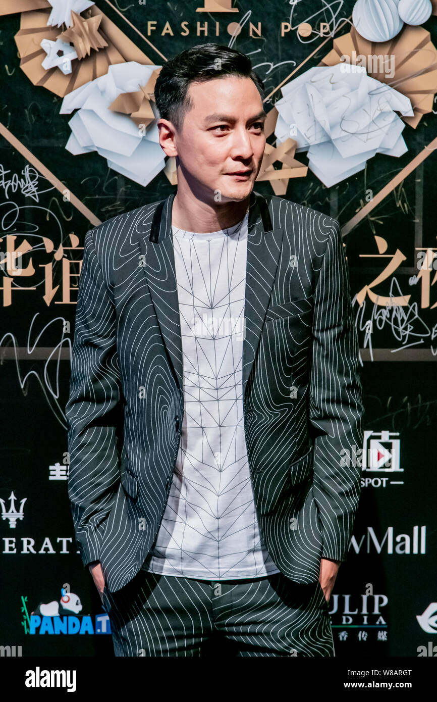 Hong Kong actor Daniel Wu poses at a fashion event held by Huayi ...