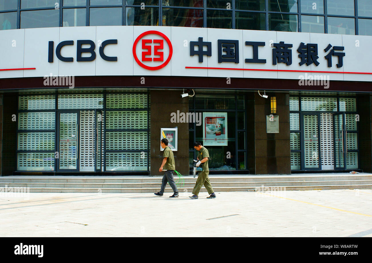 --FILE--Pedestrians walk past a branch of ICBC (Industrial and ...