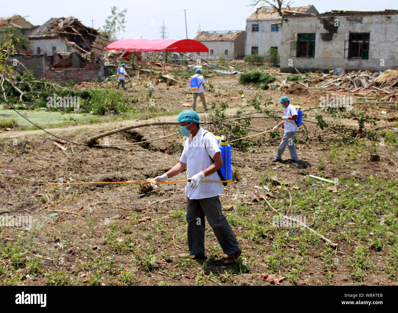Chinese medical workers disinfect Zhiqiao village devastated by the ...