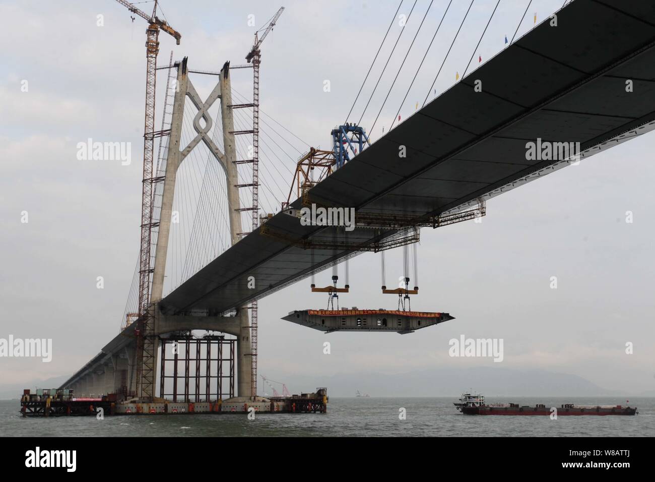 --FILE--A box girder is being lifted before installed in a section of ...