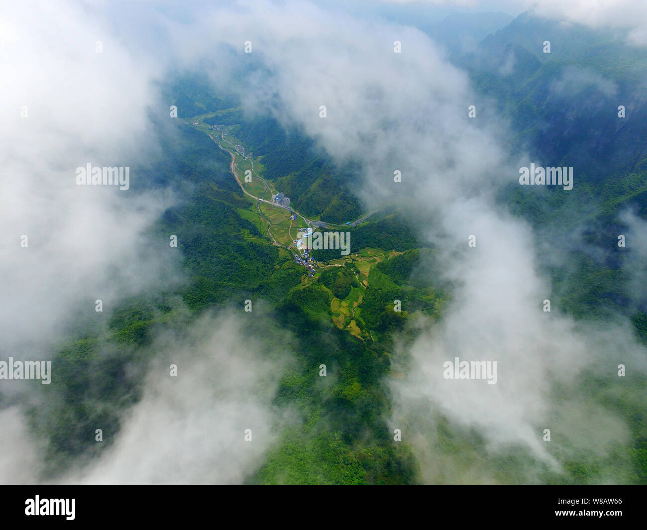 Landscape of the sea of clouds after rainfall in Tianmen Mountain (or ...
