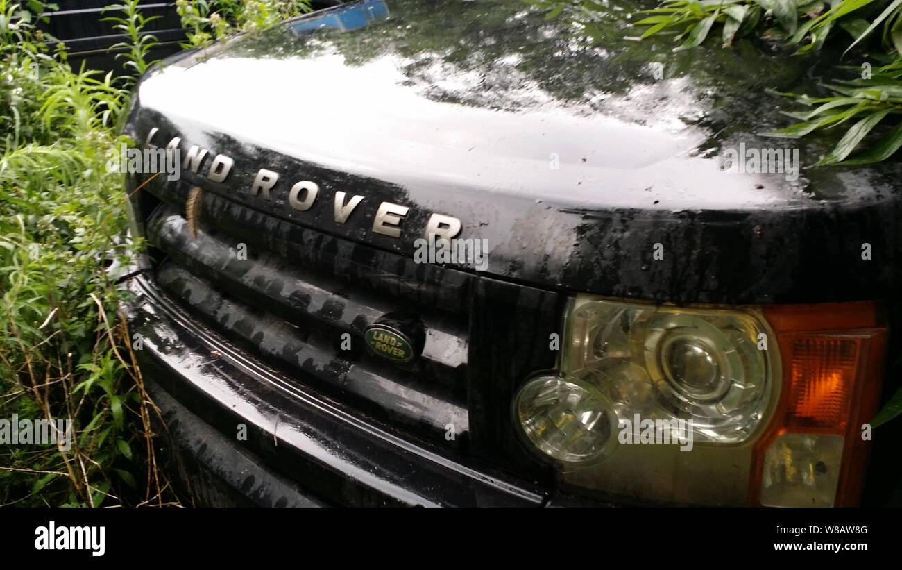 A Land Rover SUV is parked in an impound lot after its owner did not ...