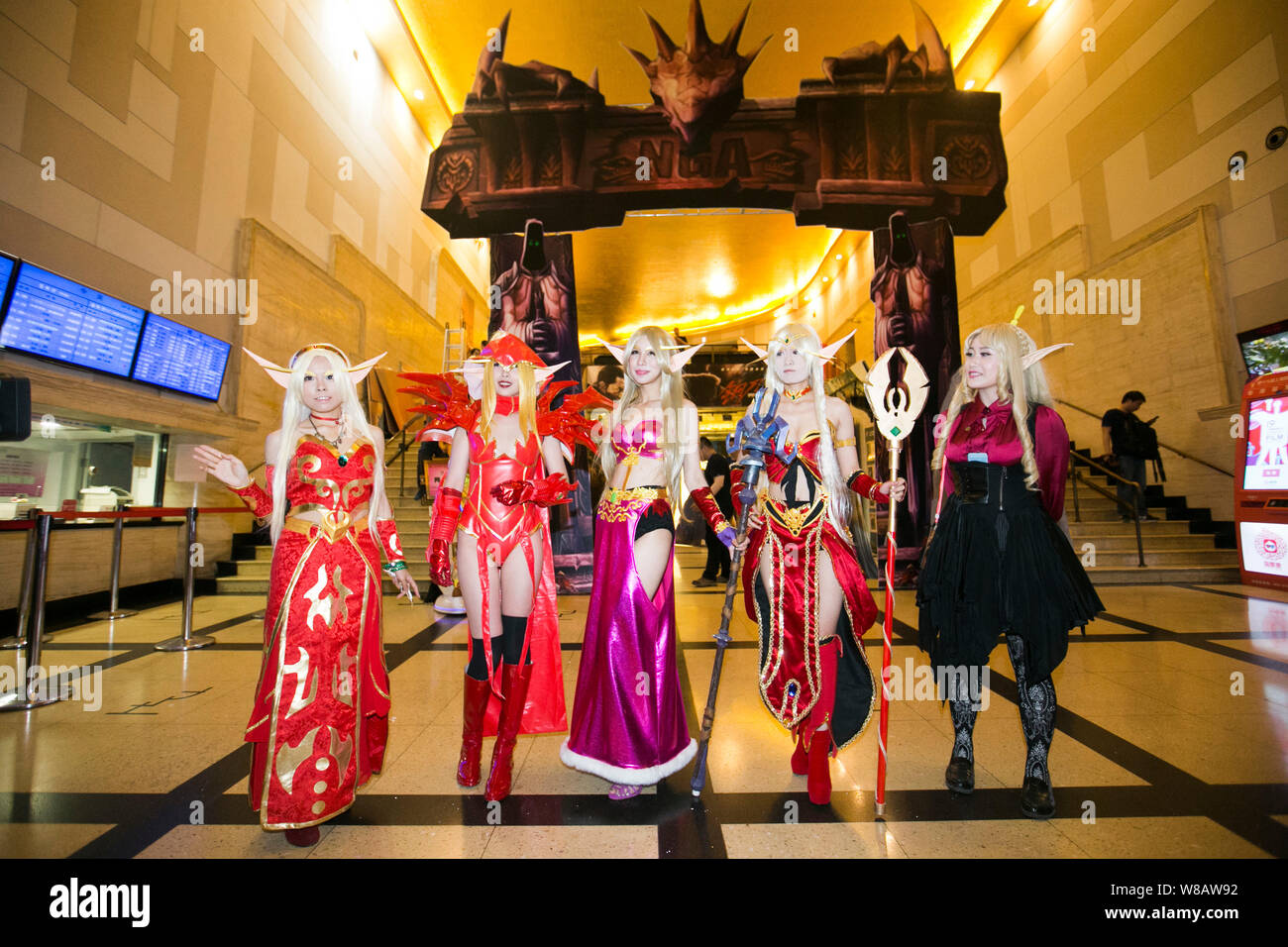 Female Chinese cosplayers dressed in costumes of Warcraft attend a ...