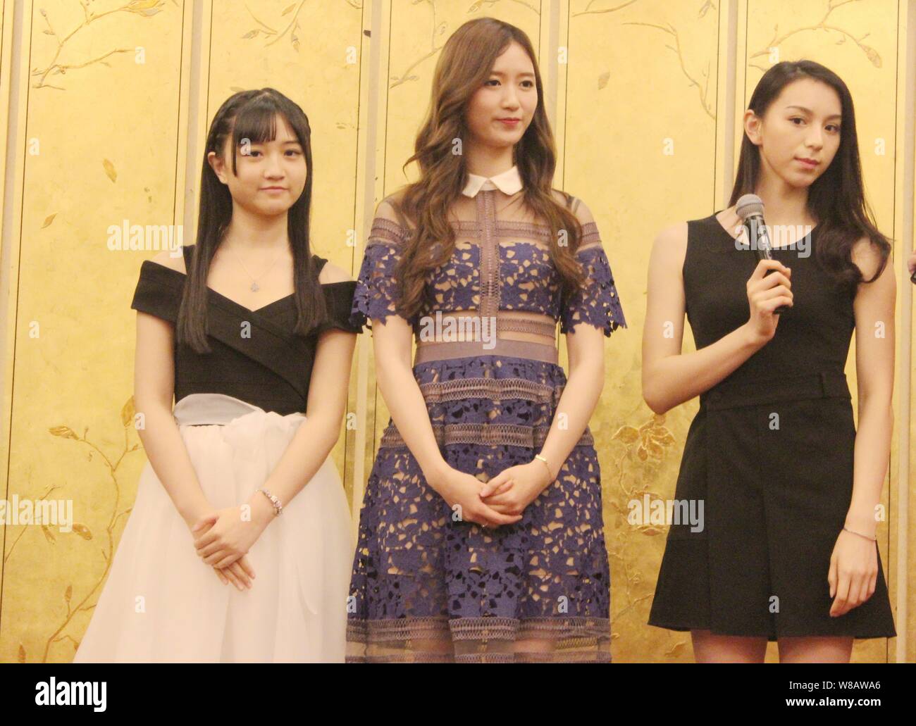 Fei Qinyuan, left, of Chinese girl group SNH48 TEAM XII and Wu Zhehan ...