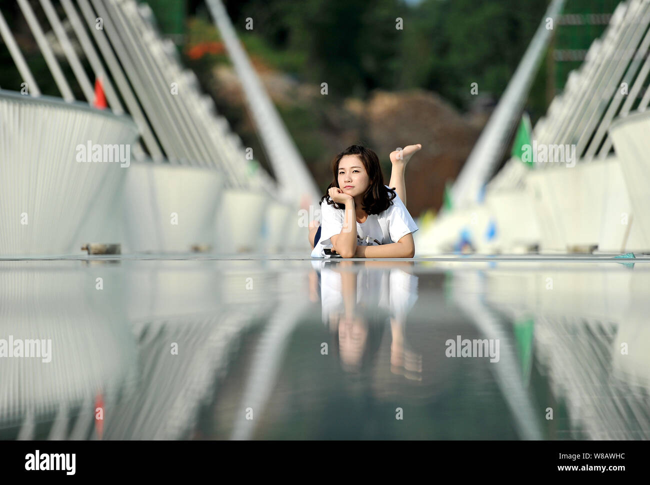 A Chinese beauty poses for photos on the world's longest and highest ...