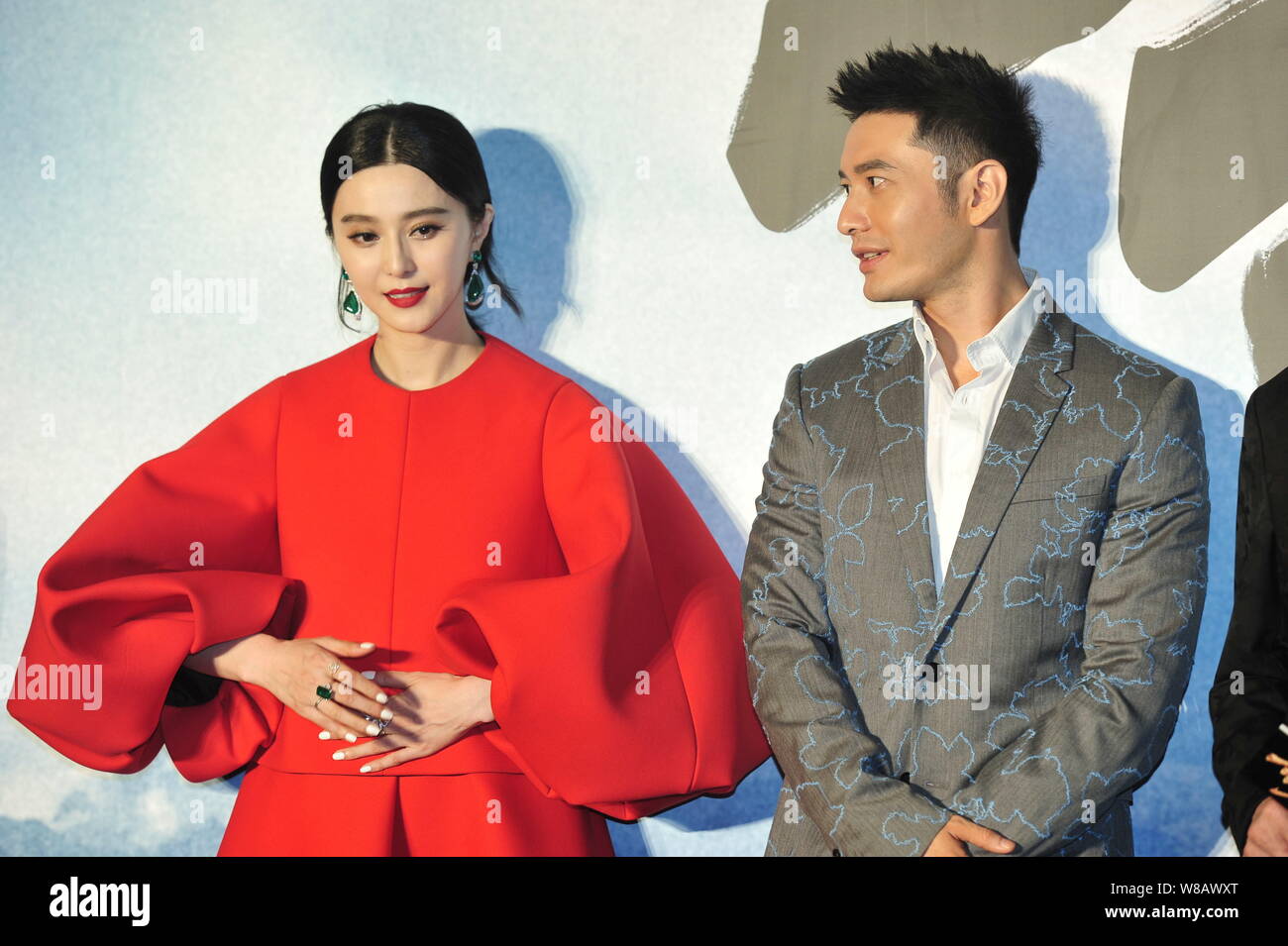 Chinese actress Fan Bingbing, left, and actor Huang Xiaoming attend a ...