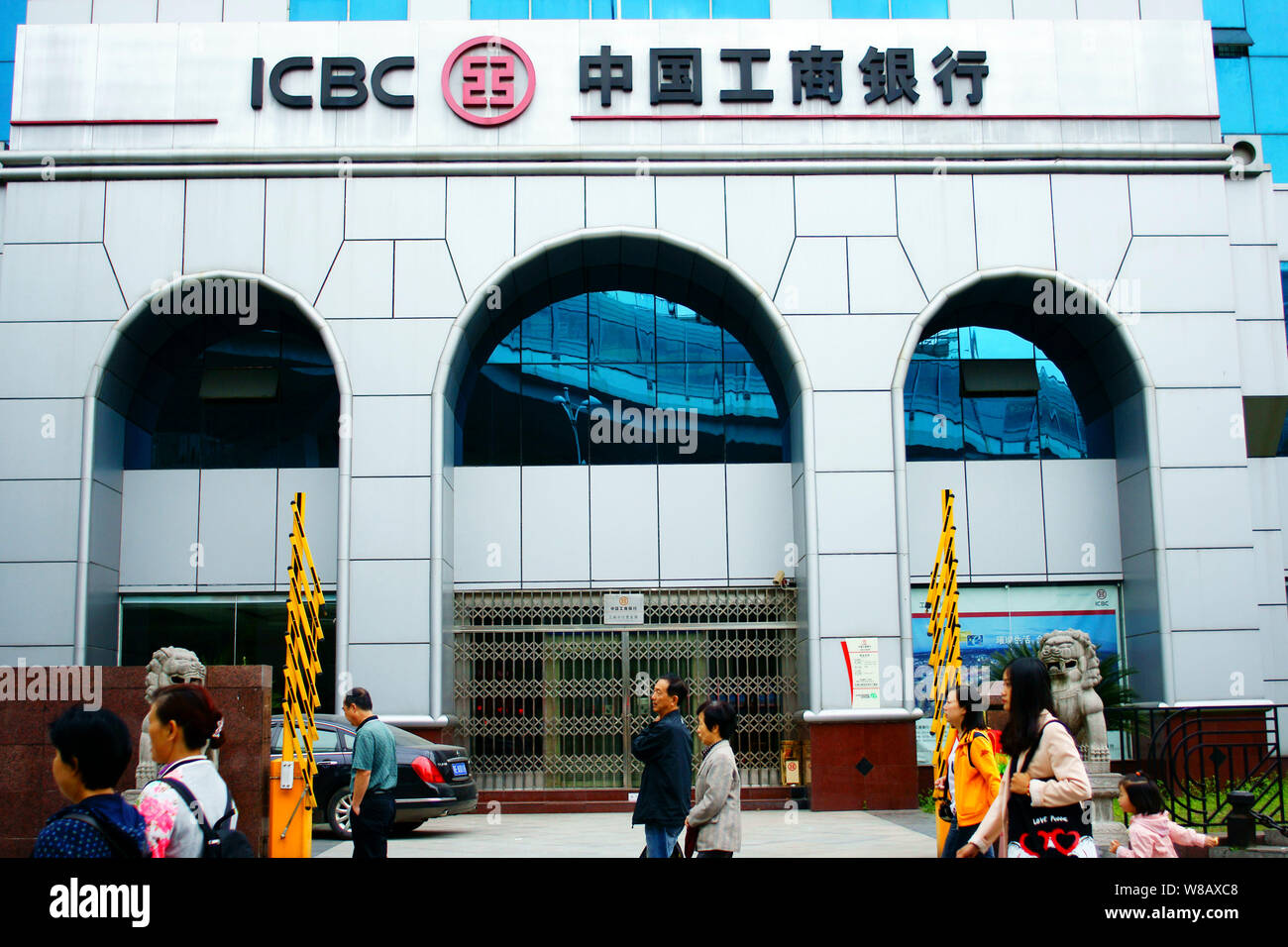 --FILE--Pedestrians walk past a branch of ICBC (Industrial and ...
