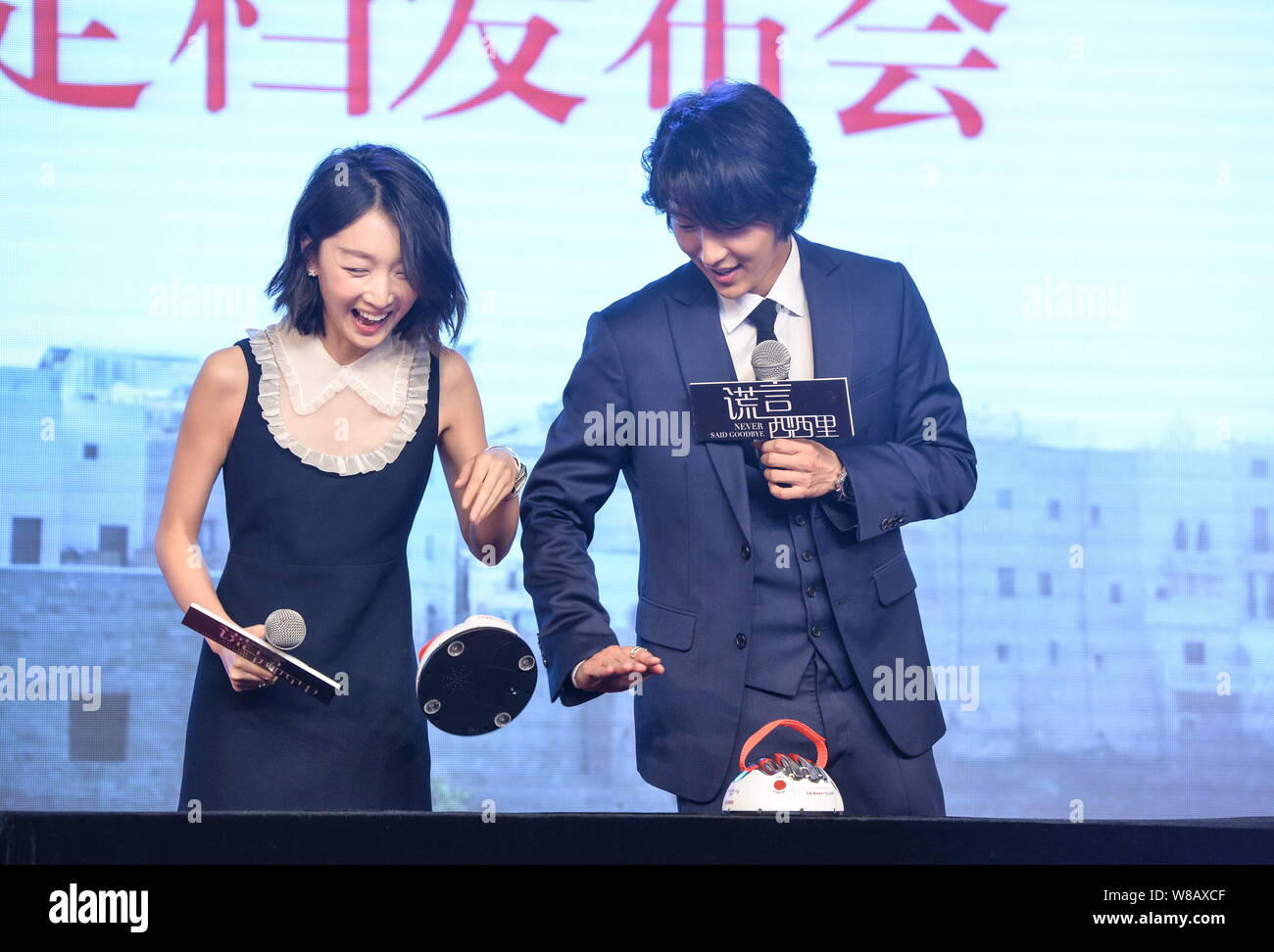 Chinese actress Zhou Dongyu, left, and South Korean actor Lee Joon-gi ...