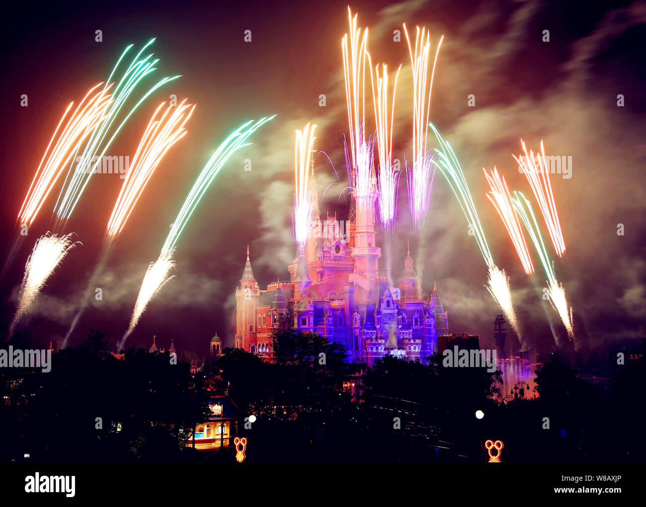 --FILE--Fireworks explode over the Disney Castle at night in the ...