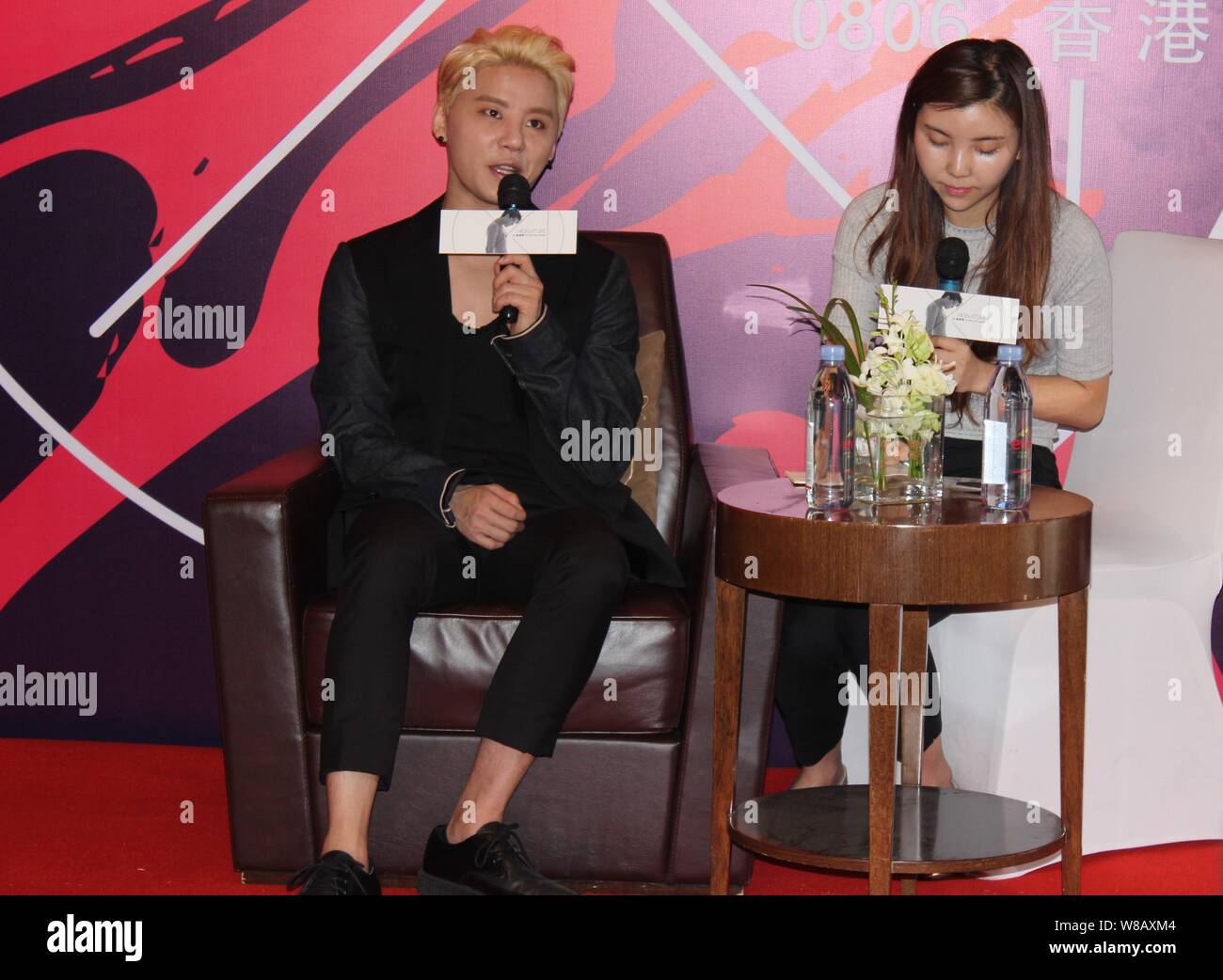 South Korean singer-songwriter Kim Jun-su, left, also known by his ...