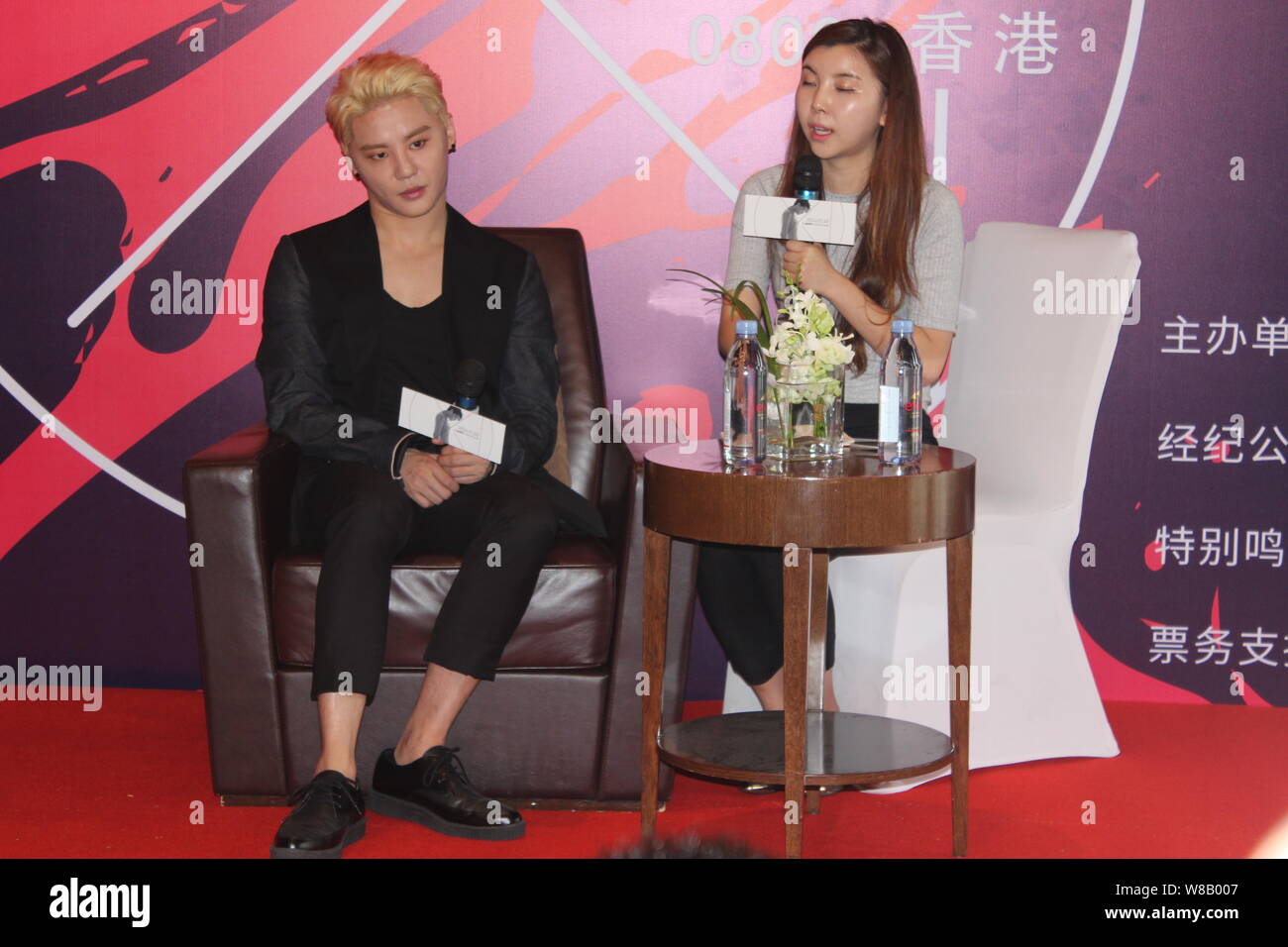 South Korean singer-songwriter Kim Jun-su, left, also known by his ...