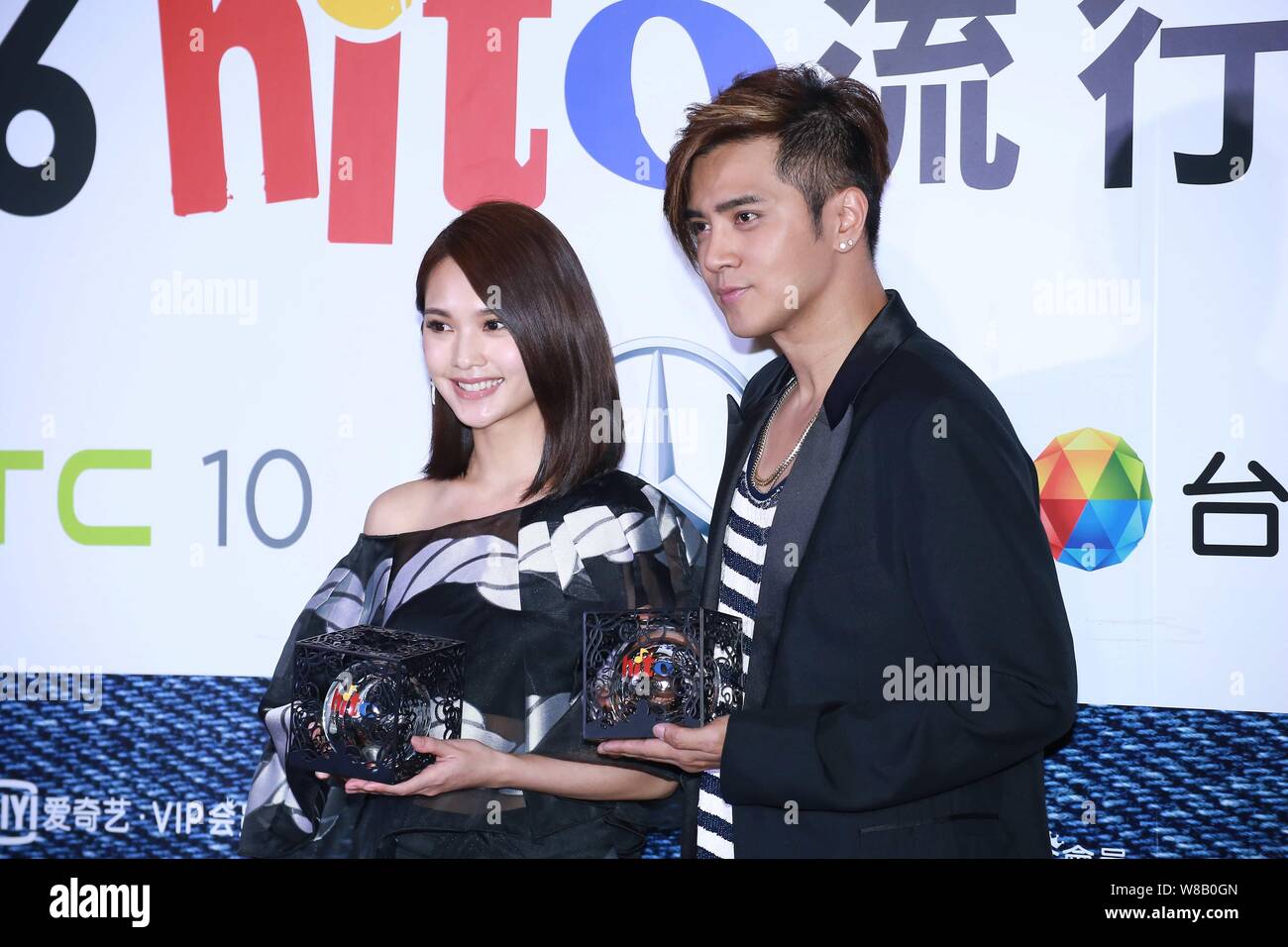 Taiwanese singers Rainie Yang, left, and Show Lo pose with their ...