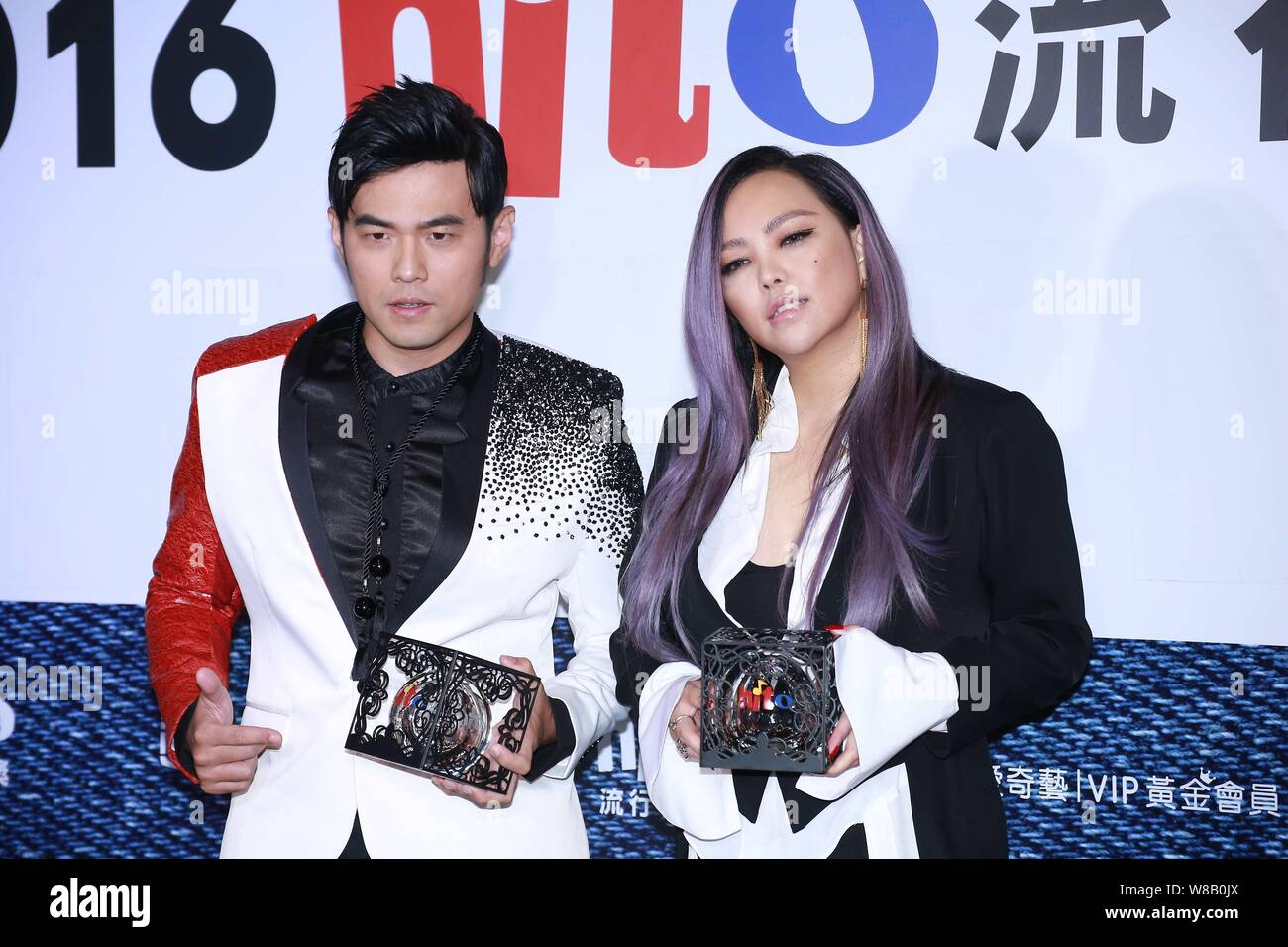 Taiwanese singers A-Mei or Chang Hui-mei, right, and Jay Chou pose with ...