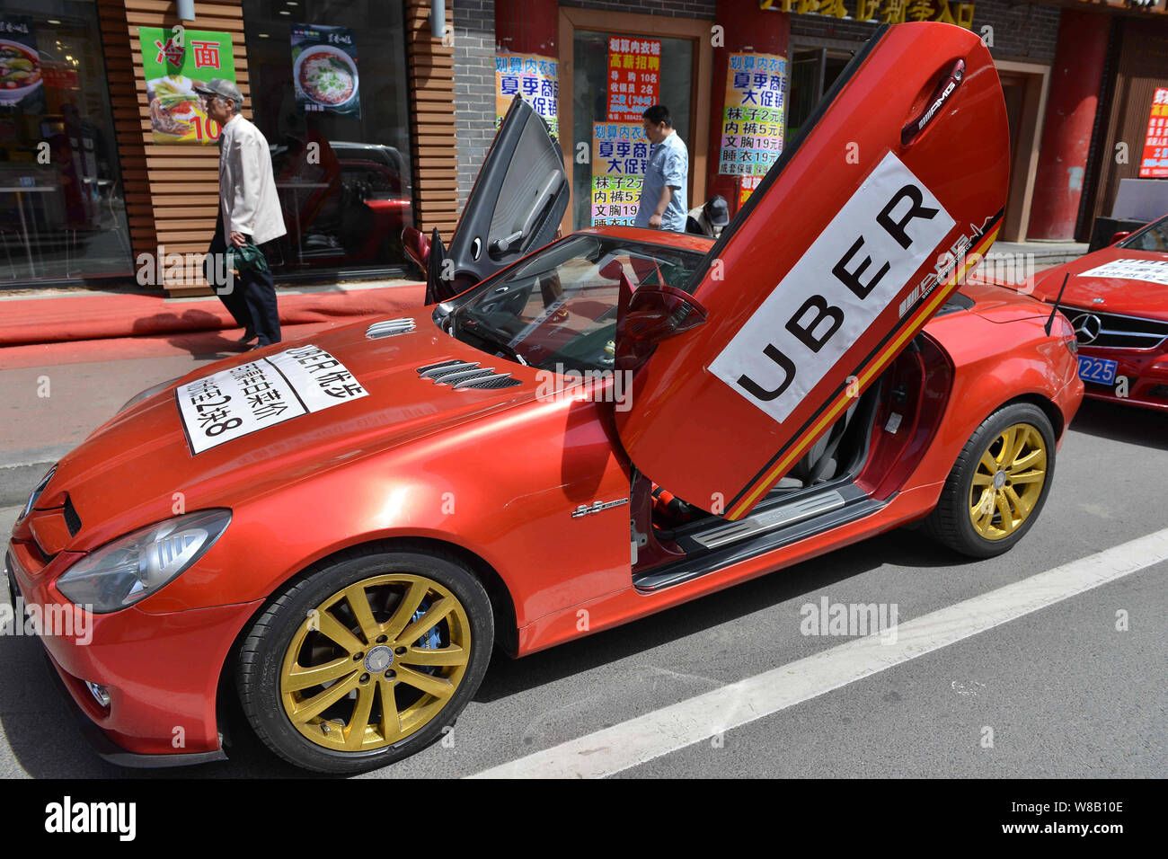 Uber car parked hi-res stock photography and images - Alamy