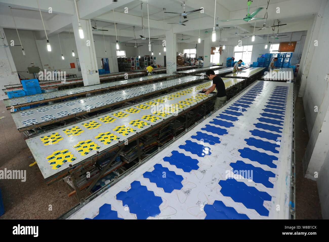 Sports factory workers hi-res stock photography and images - Alamy