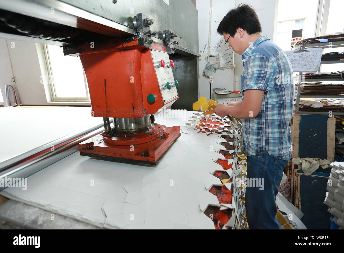 Football factory machine hi-res stock photography and images - Alamy