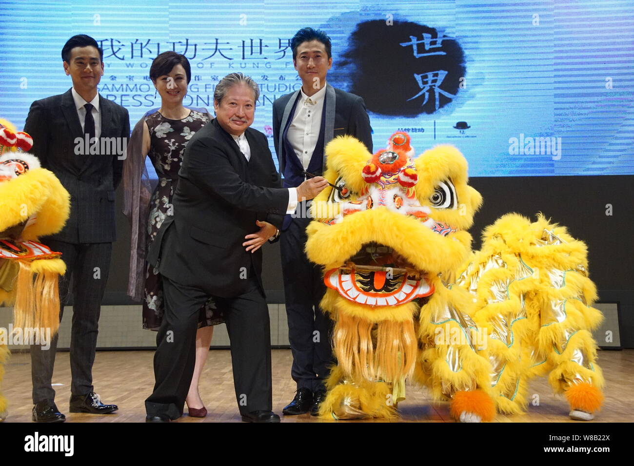 Hong Kong director and actor Sammo Hung, second right, Taiwanese actor ...
