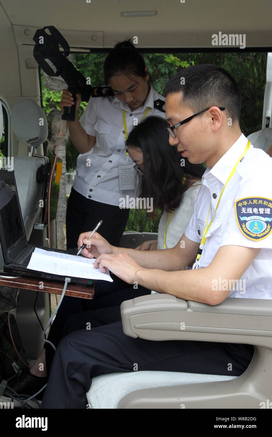 Chinese radio management officers monitor radio signals during an ...