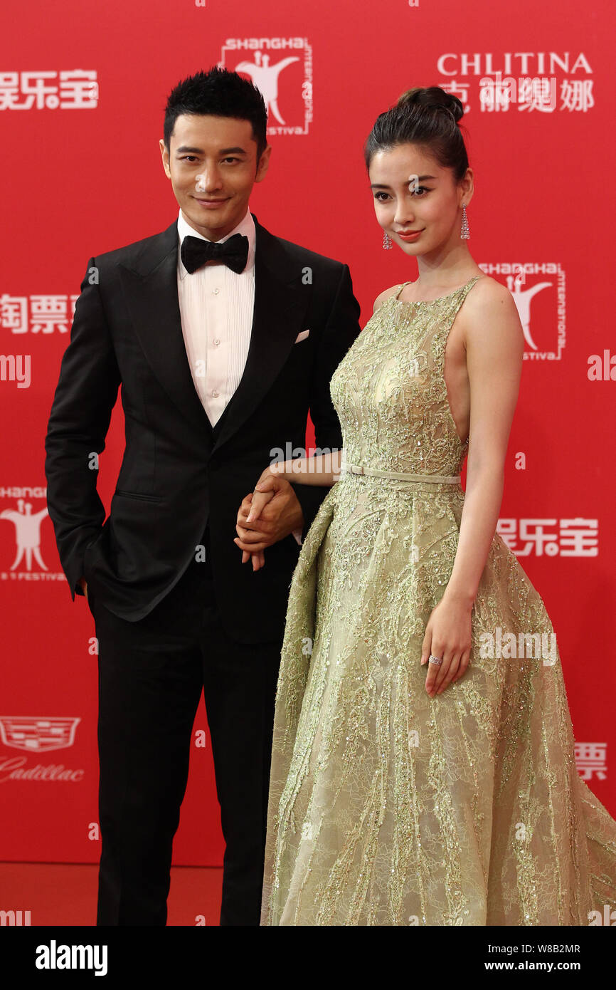 Hong Kong model and actress Angelababy, right, and her Chinese actor husband Huang Xiaoming ...
