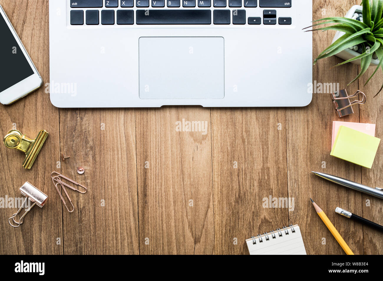 Top view of office desk table with modern laptop and accessories ...