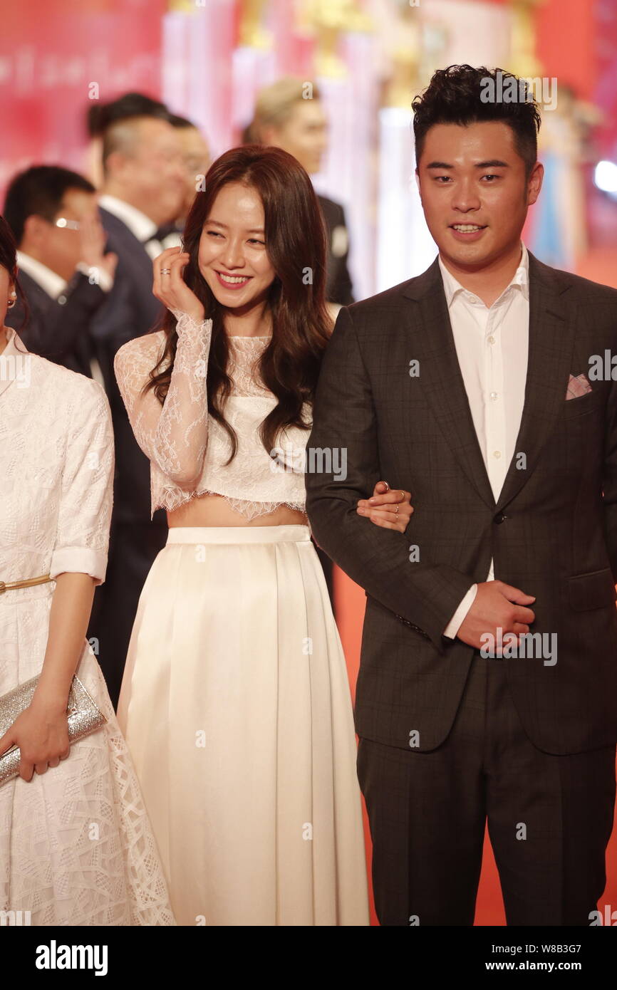 South Korean actress Cheon Seong-im, left, second left, better known by her stage name Song Ji ...