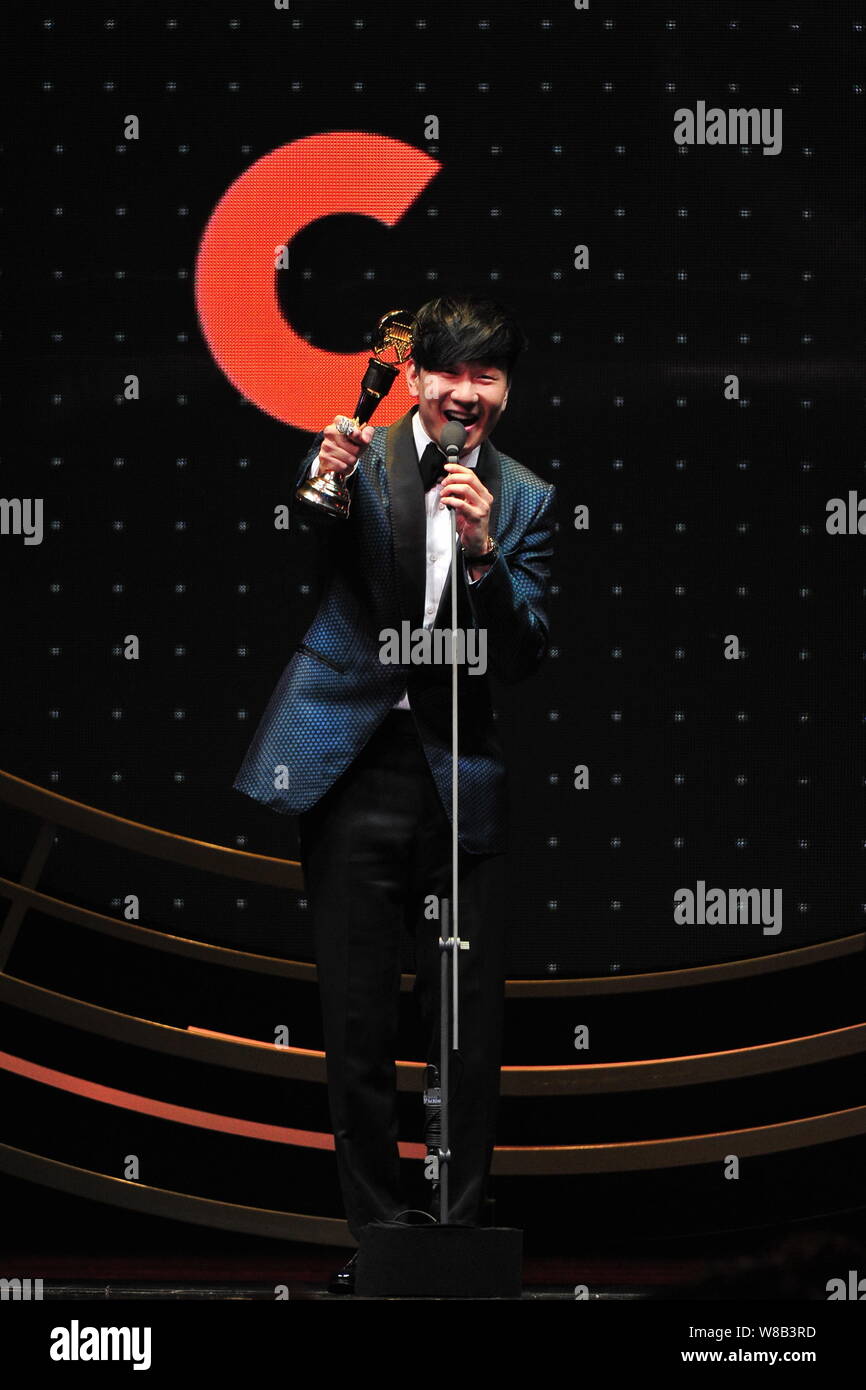 Singaporean singer JJ Lin speaks after winning his trophy for the Best ...