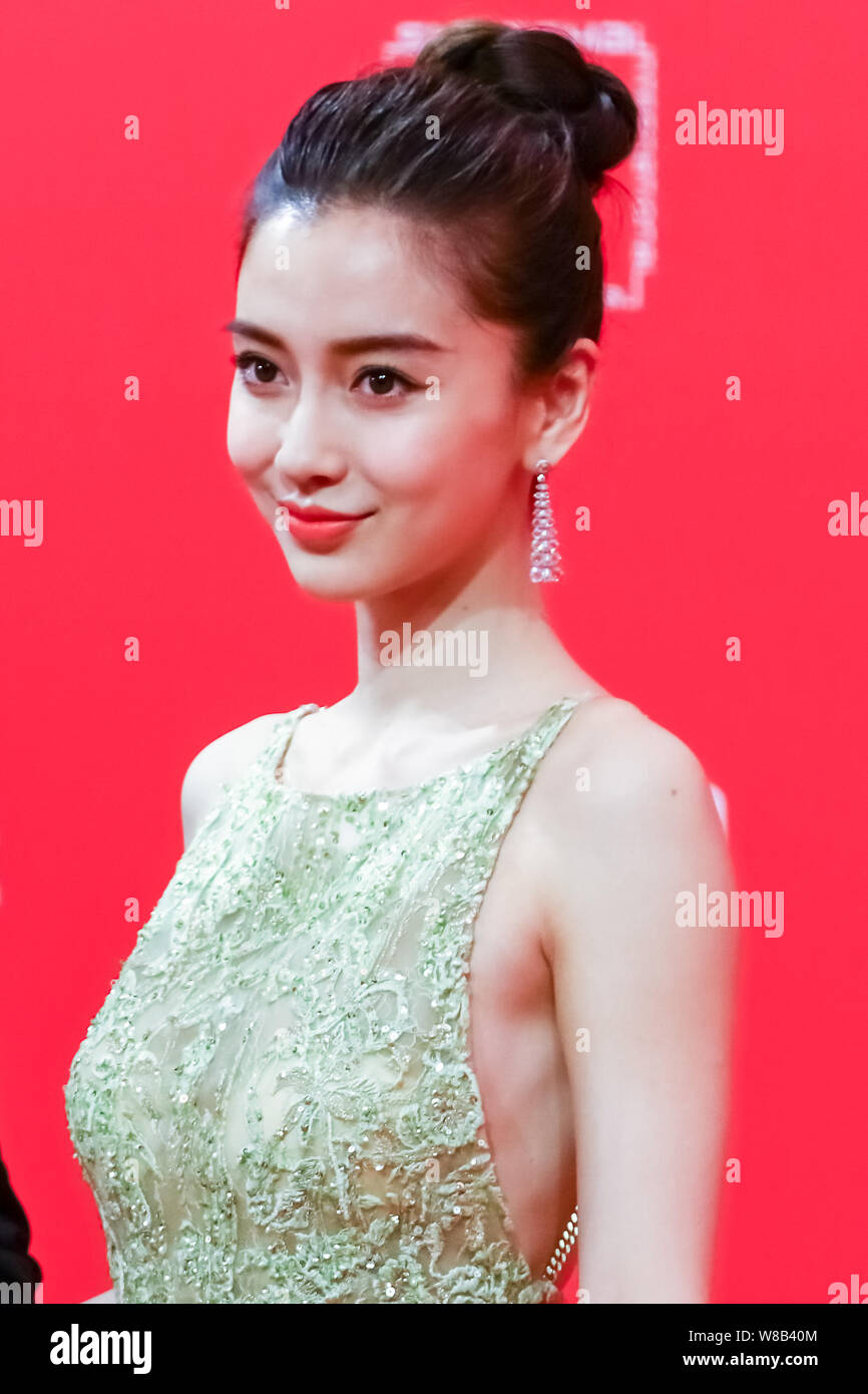 Hong Kong model and actress Angelababy arrives on the red carpet for the opening ceremony of the ...