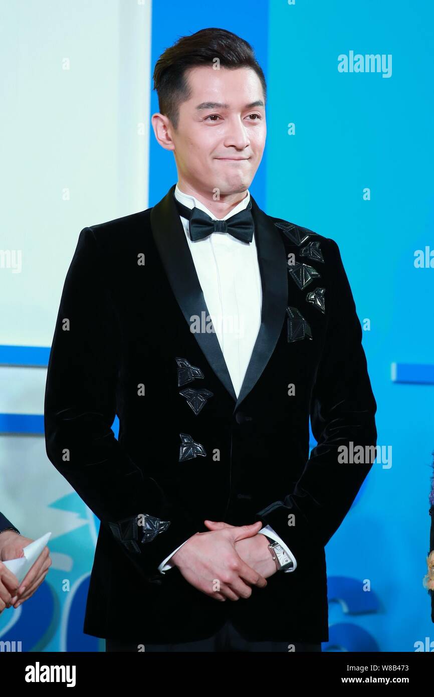 Chinese actor Hu Ge arrives on the red carpet for the closing ceremony ...