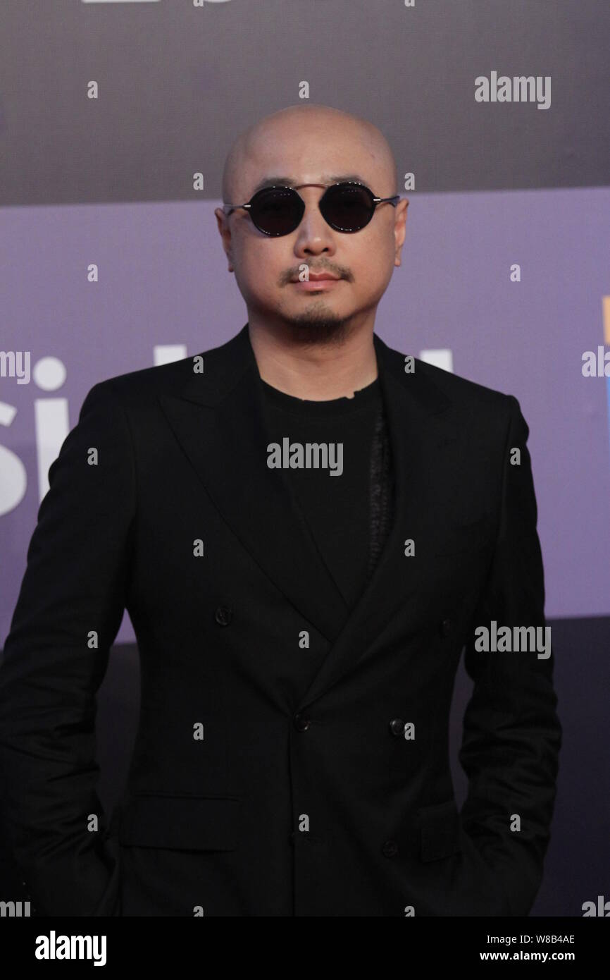 Chinese film director and actor Xu Zheng arrives on the red carpet for ...
