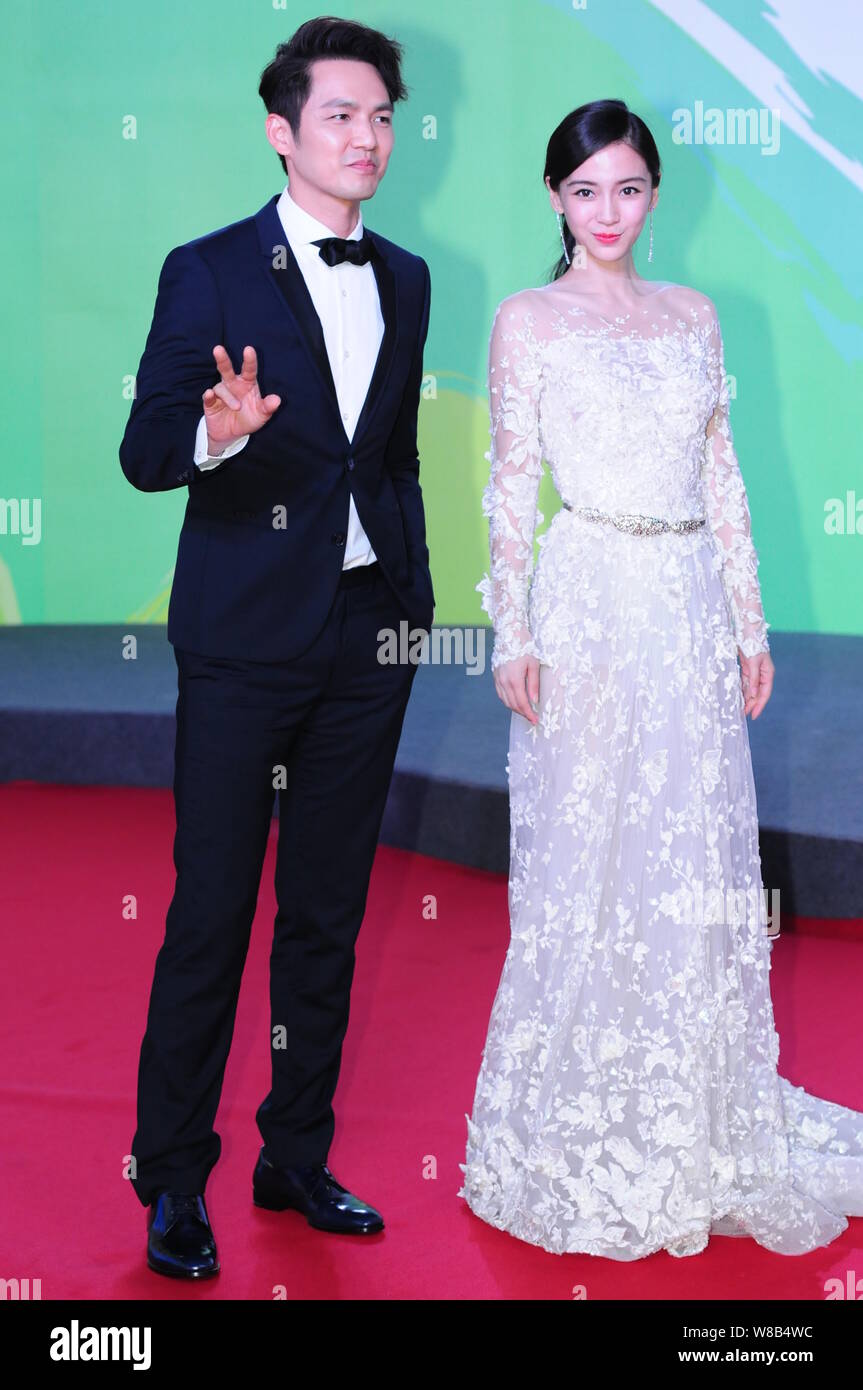 Hong Kong model and actress Angelababy, right, and actor Wallace Chung ...