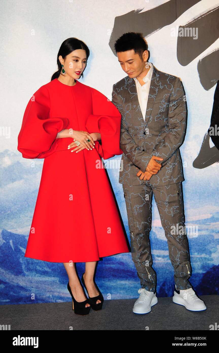 Chinese actress Fan Bingbing, left, and actor Huang Xiaoming attend a ...