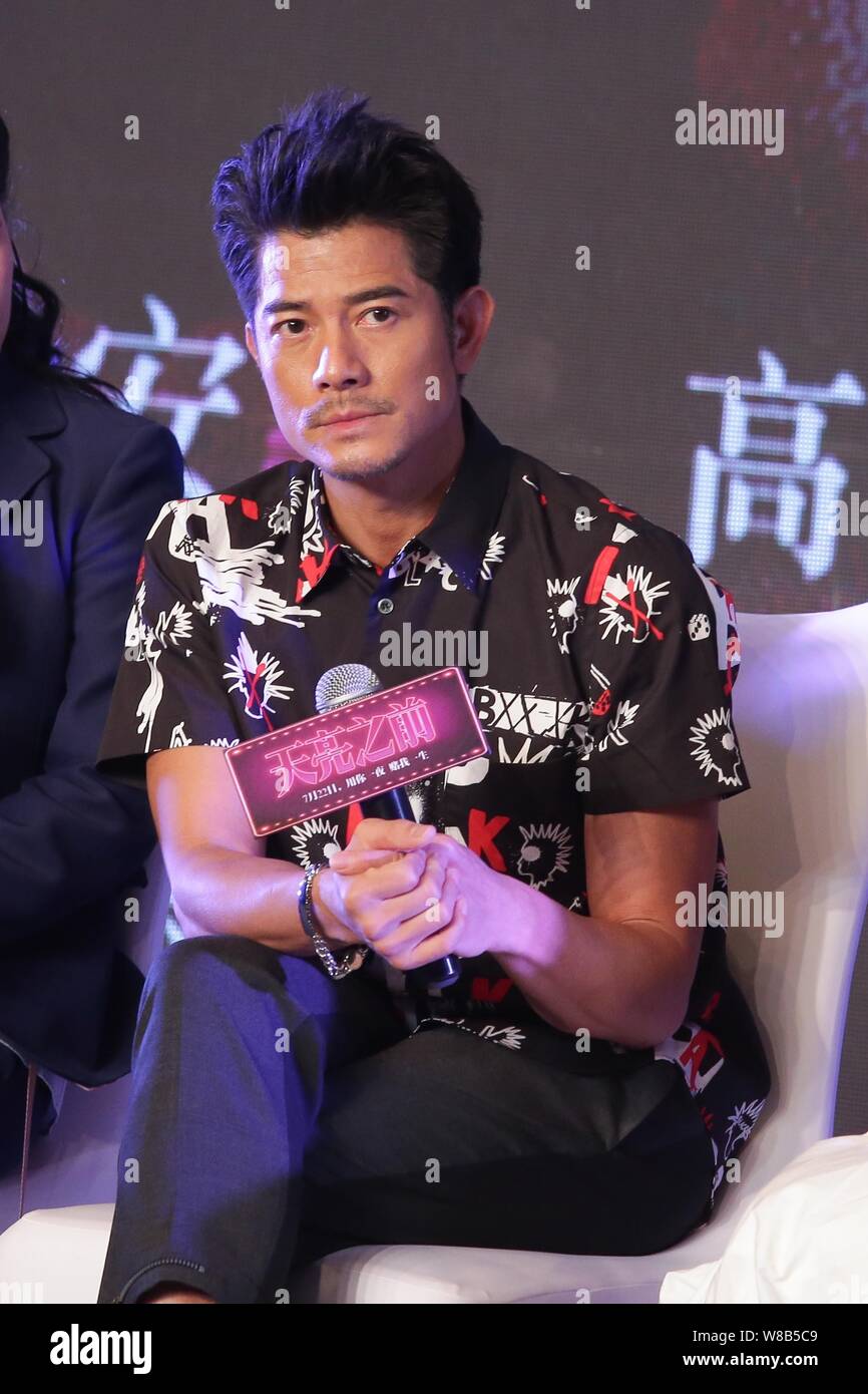 Hong Kong actor Aaron Kwok attends a press conference to promote his new movie "One Night Only ...