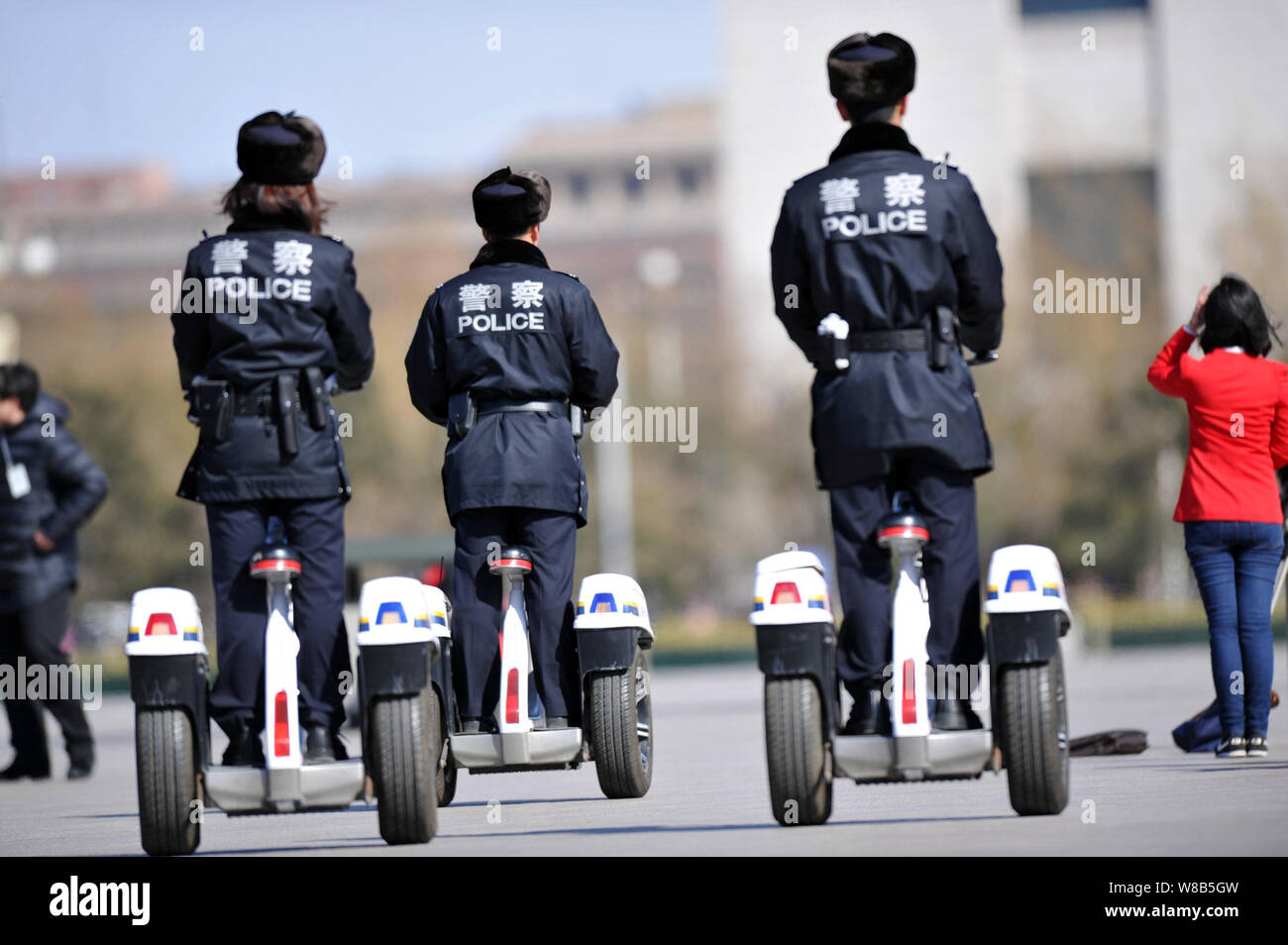 --FILE--Chinese police officers ride self-balancing electric scooters ...
