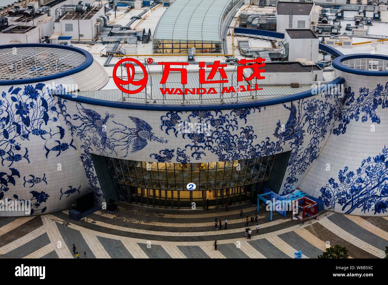 People visit the Wanda Mall at the Nanchang Wanda Cultural Tourism City ...