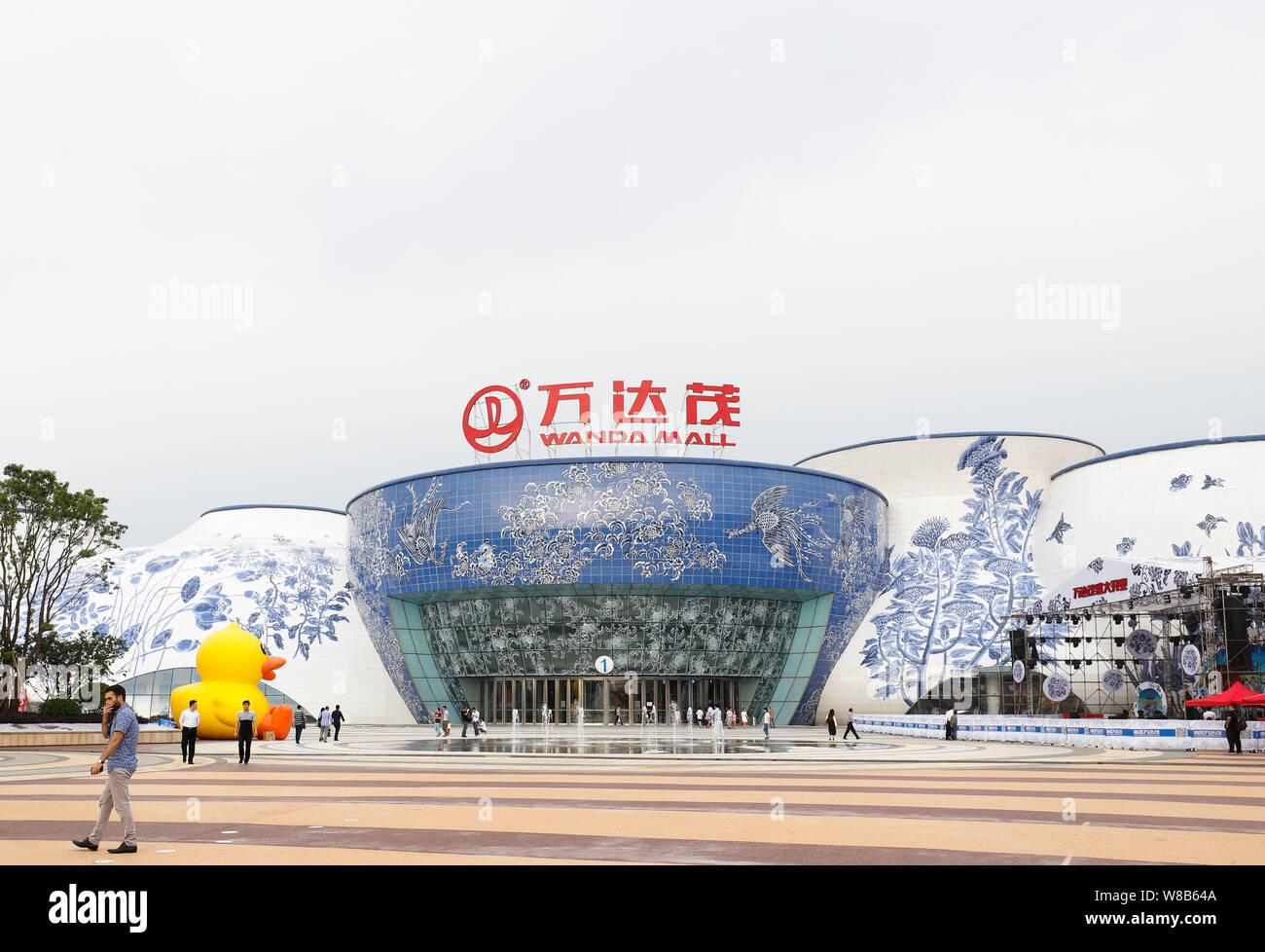 People visit the Wanda Mall at the Nanchang Wanda Cultural Tourism City ...