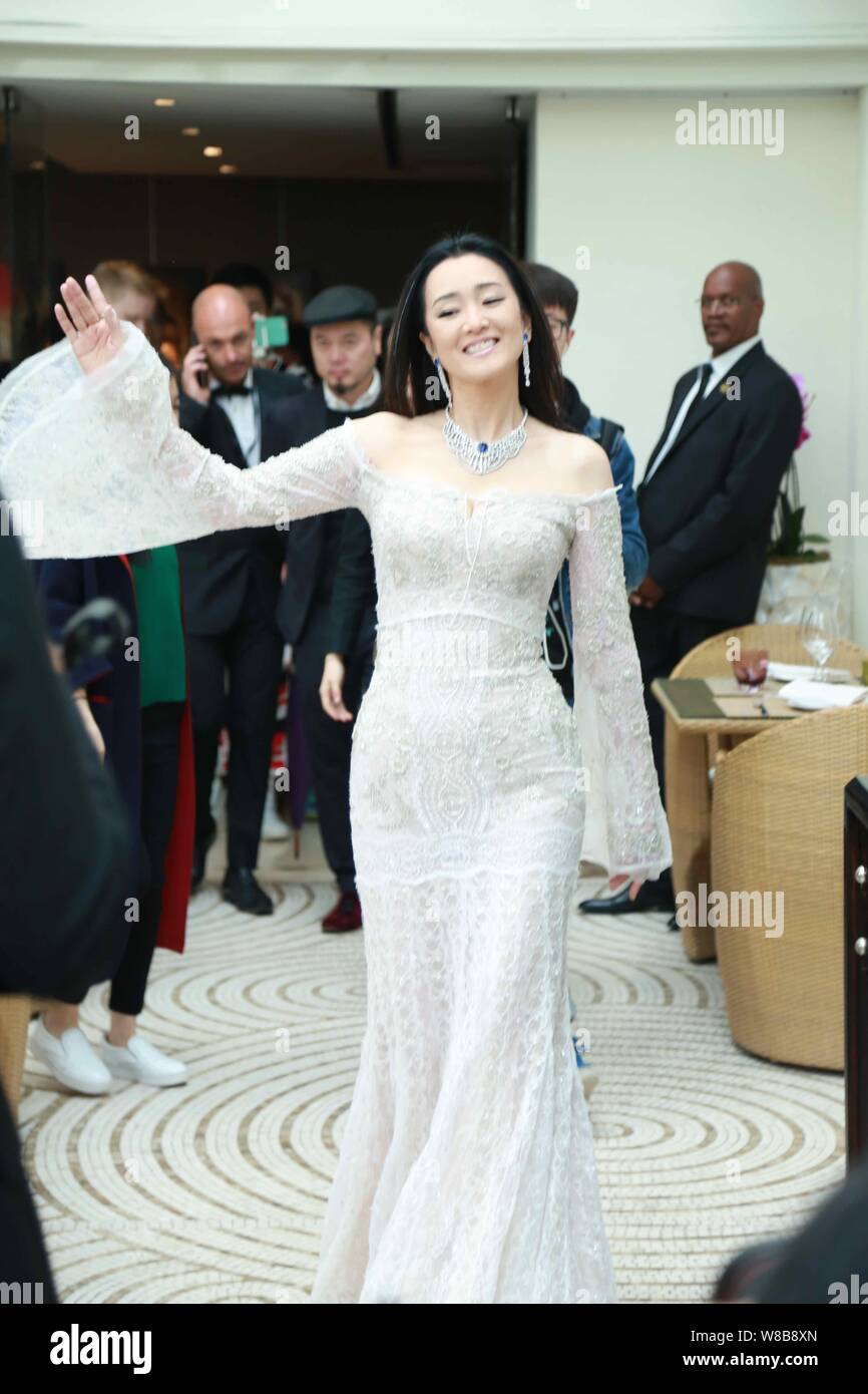 Chinese actress Gong Li arrives at the L'Oreal cocktail party during ...